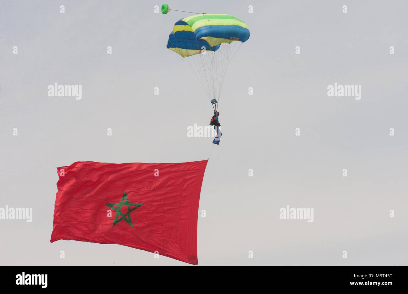 A parachutist glides down after jumping from a Moroccan aircraft during ...