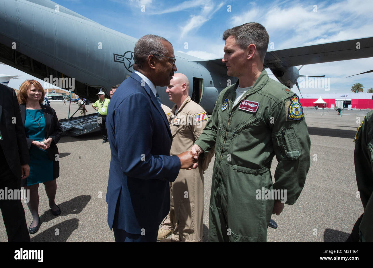 Mr. Dwight Bush (left), U.S. Ambassador to Morocco, shakes the hand of ...
