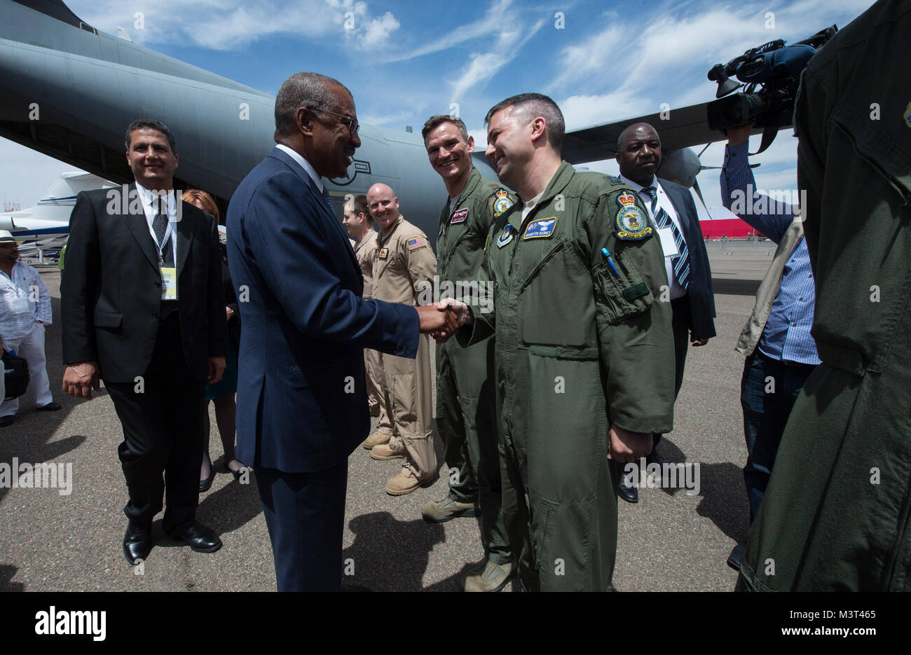 Mr. Dwight Bush (left), U.S. Ambassador to Morocco, shakes the hand of ...