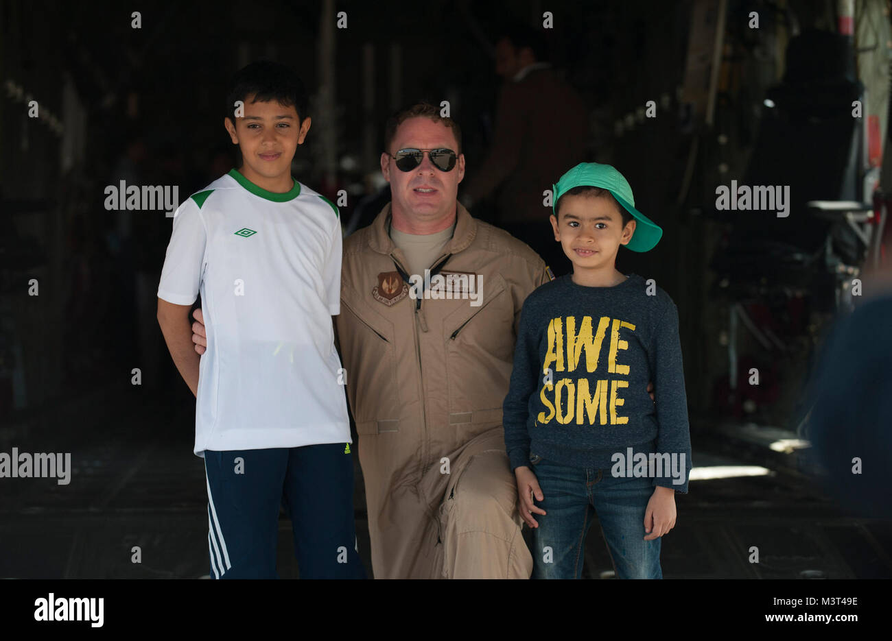 U.S. Air Force Captain Frank Zientek (center), a pilot with the 37th ...