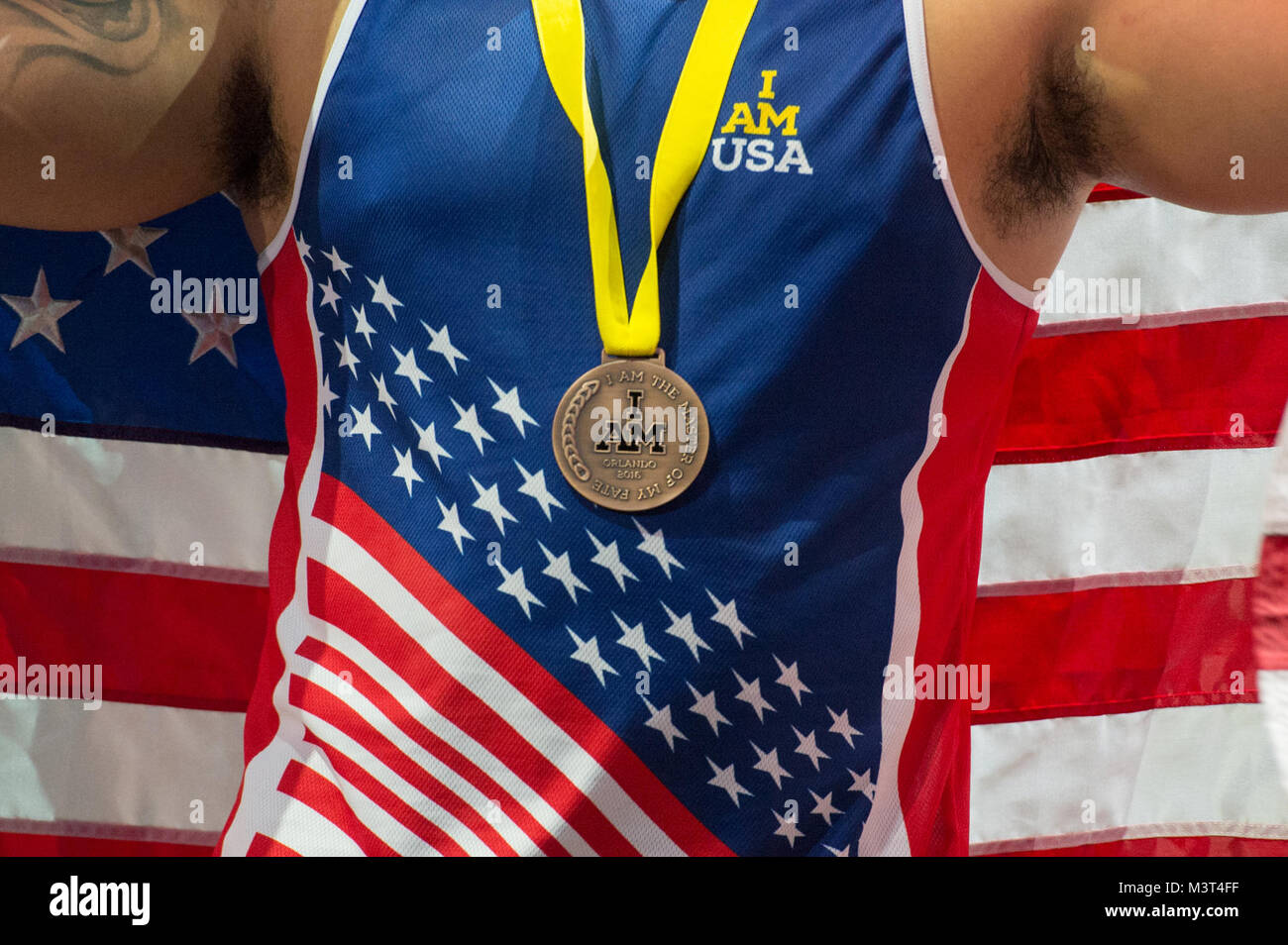 A U.S. Invictus team athlete displays his medal during the 2016 ...