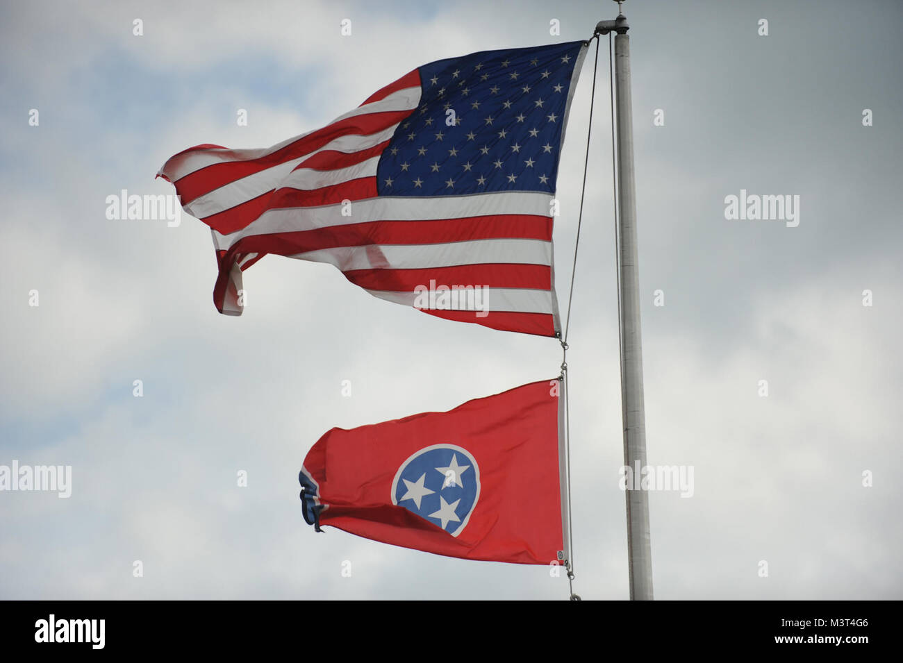 United States and Tennessee flags fly during the 2016 Armed Forces ...