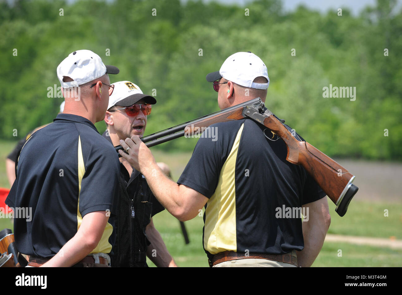 Members of the Army Skeet team talk strategy during the 2016 Armed ...