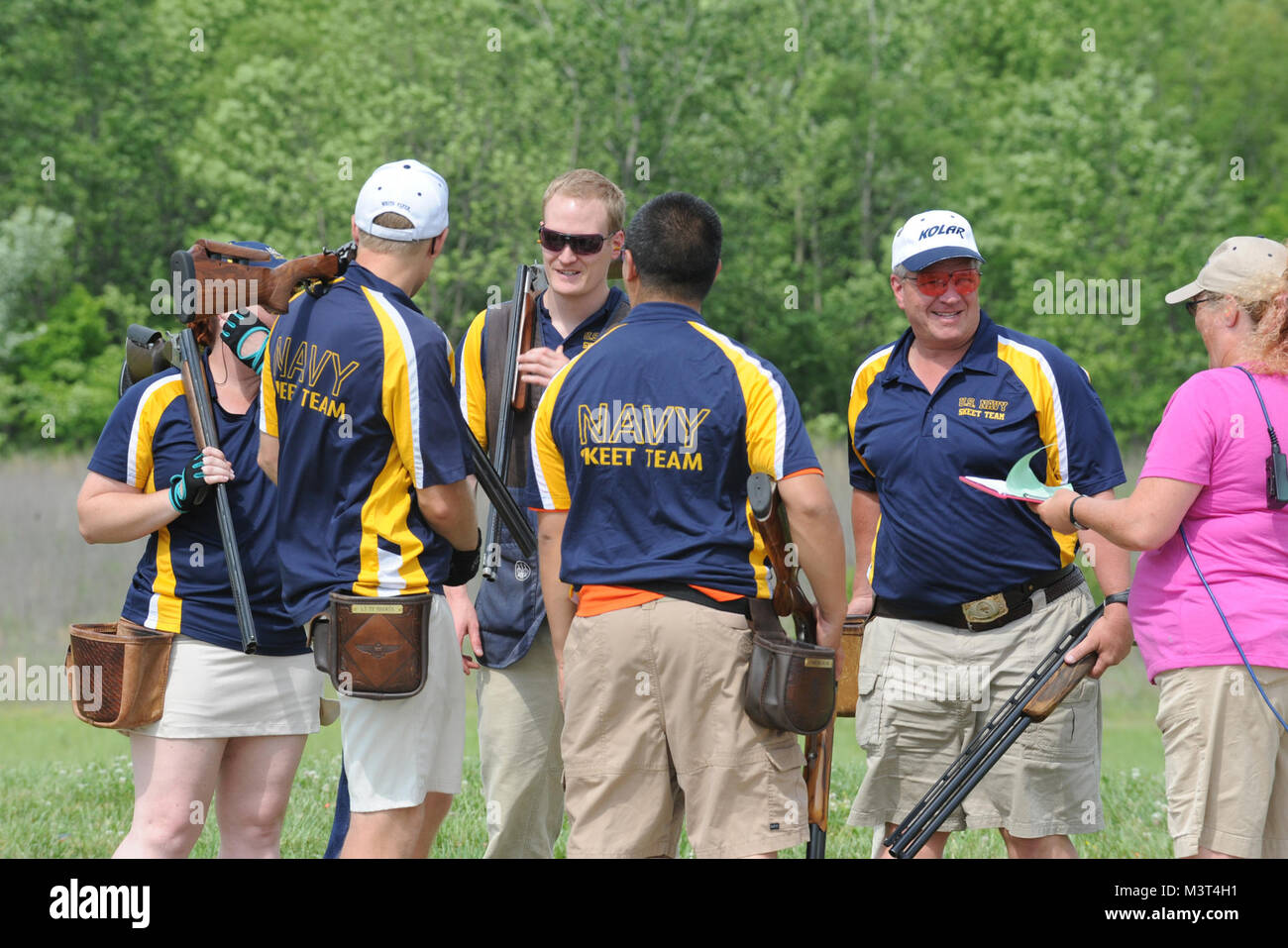 Members of the Navy Skeet team talk strategy during the 2016 Armed ...