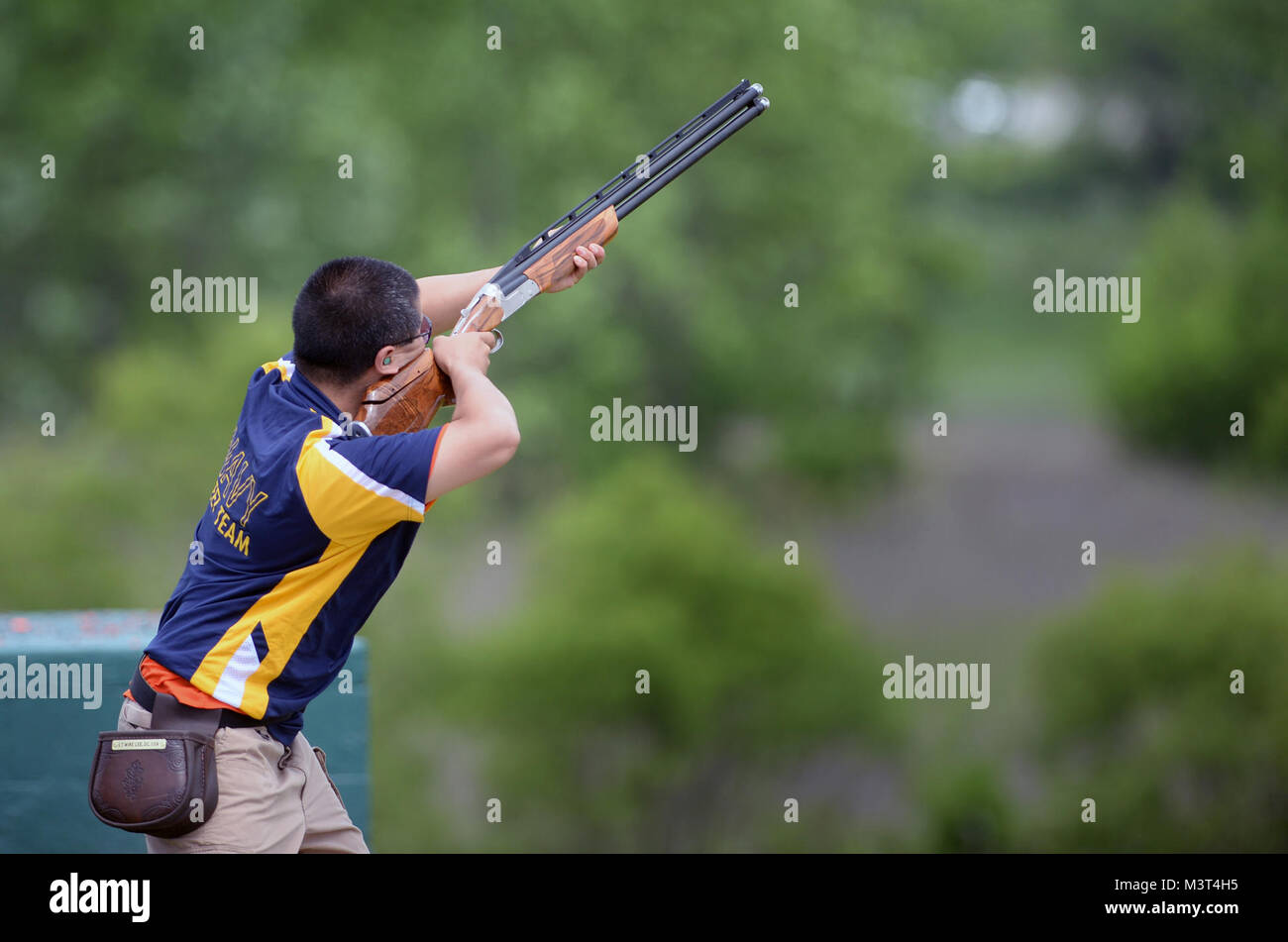 Navy Skeet Team member, Lt. Michael Lee, shoots skeet during the 2016 ...