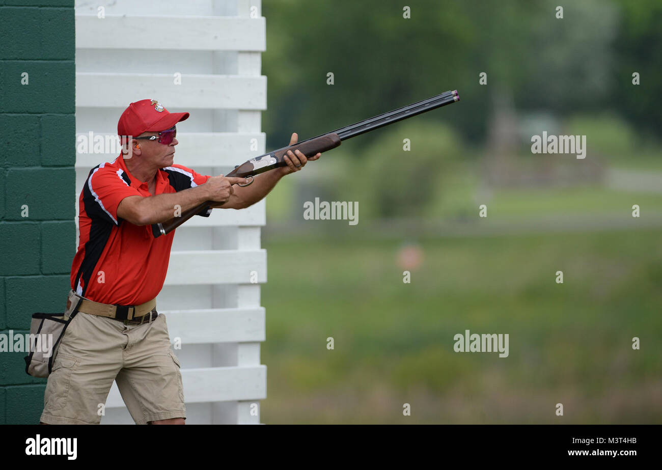 USMC Skeet Team member, Master GySgt. William McKenon shoots skeet ...