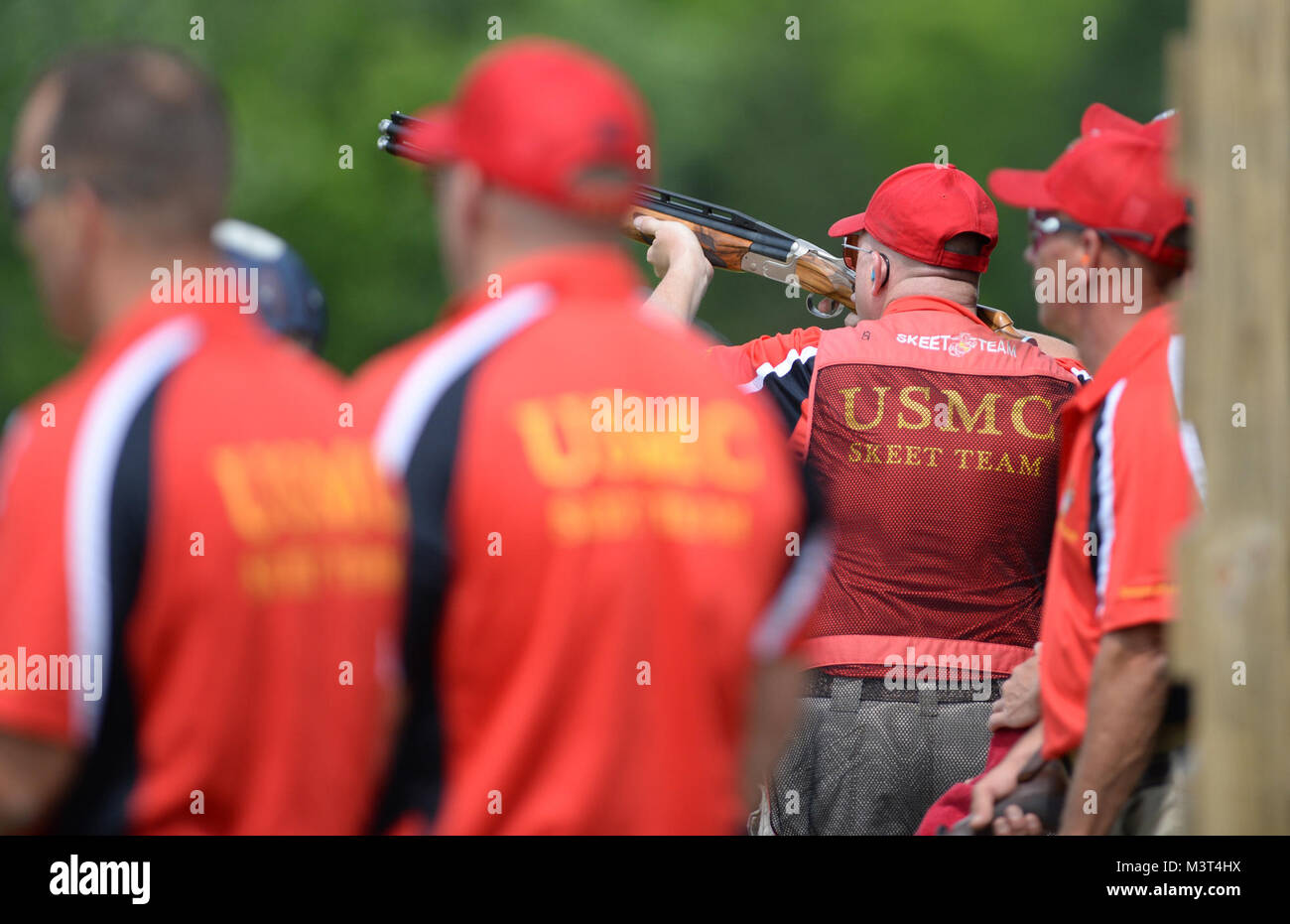 USMC Skeet Team member, GySgt. Mark Stewart shoots skeet during the ...