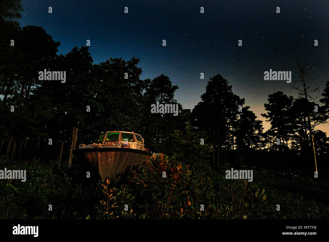 An abandoned Navy LARC-V "Duck Boat" sits in a forest near Big Muddy ...