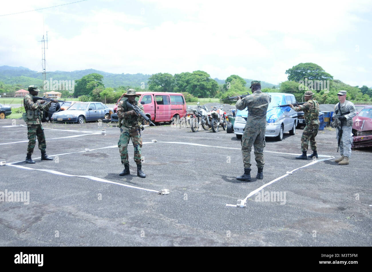 Sgt. 1st Class Curt Kinker, of the Florida National Guard, watches as ...