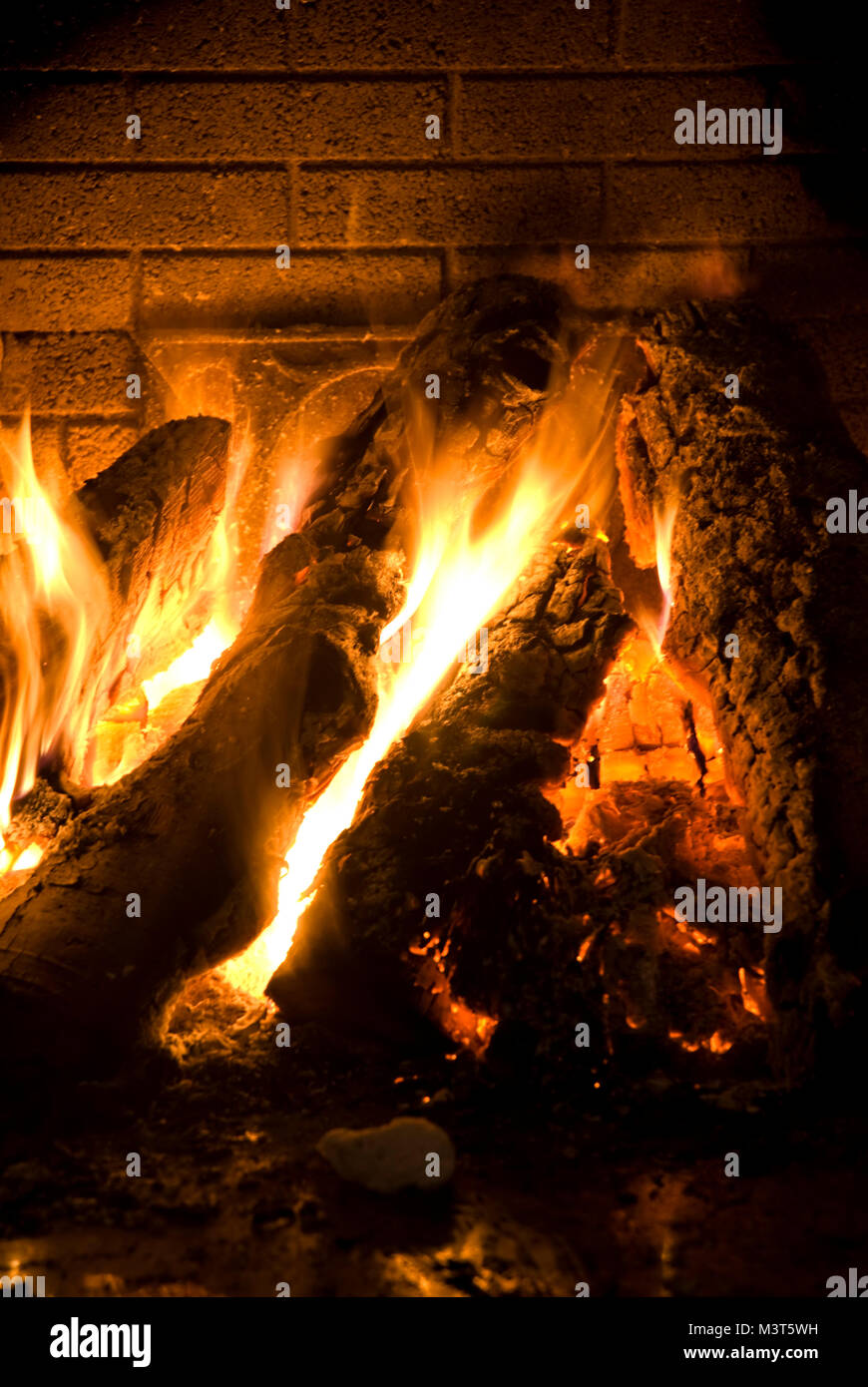fire lit in the fireplace of the house Stock Photo - Alamy