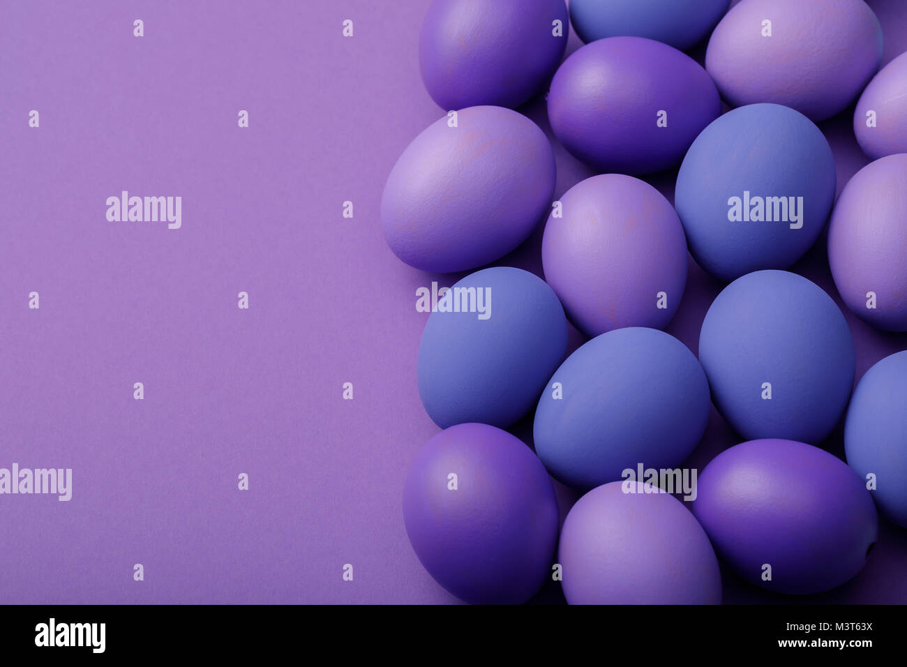 Purple easter eggs on a paper background with space for text Stock ...