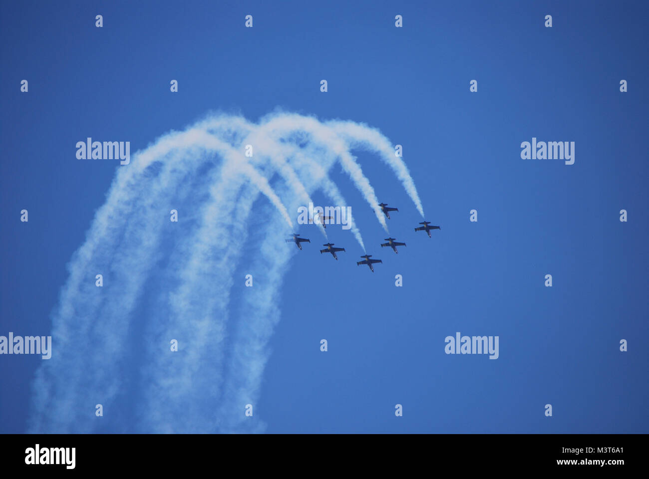 aircraft formation flying show with produce fog Stock Photo - Alamy