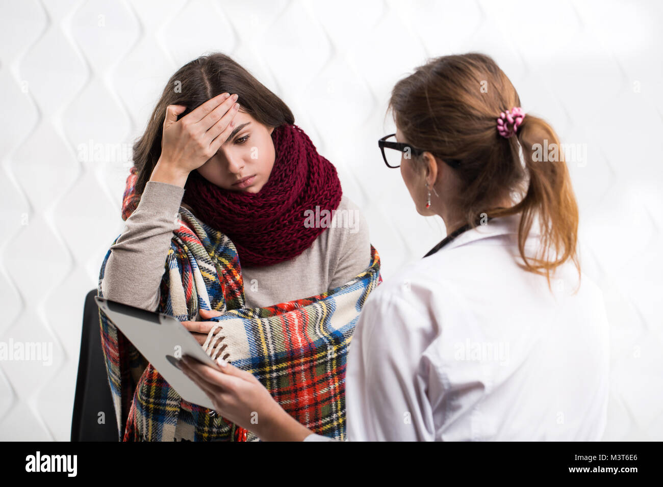 Doctor Asks Patient about Illness Stock Photo - Alamy