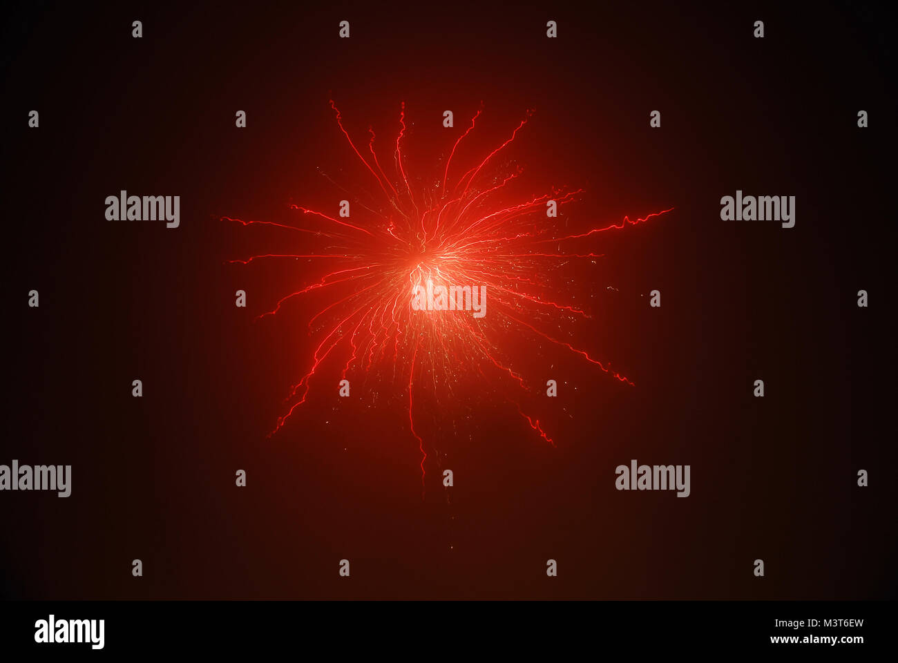 beautiful bright red fireworks on New Year Stock Photo - Alamy