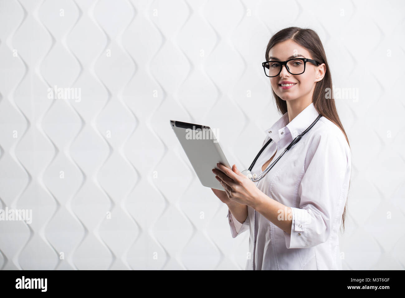 Doctor Using Tablet Stock Photo - Alamy
