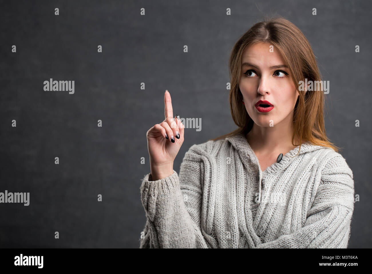 Beautiful Eye-catching Girl Have Idea Stock Photo - Alamy