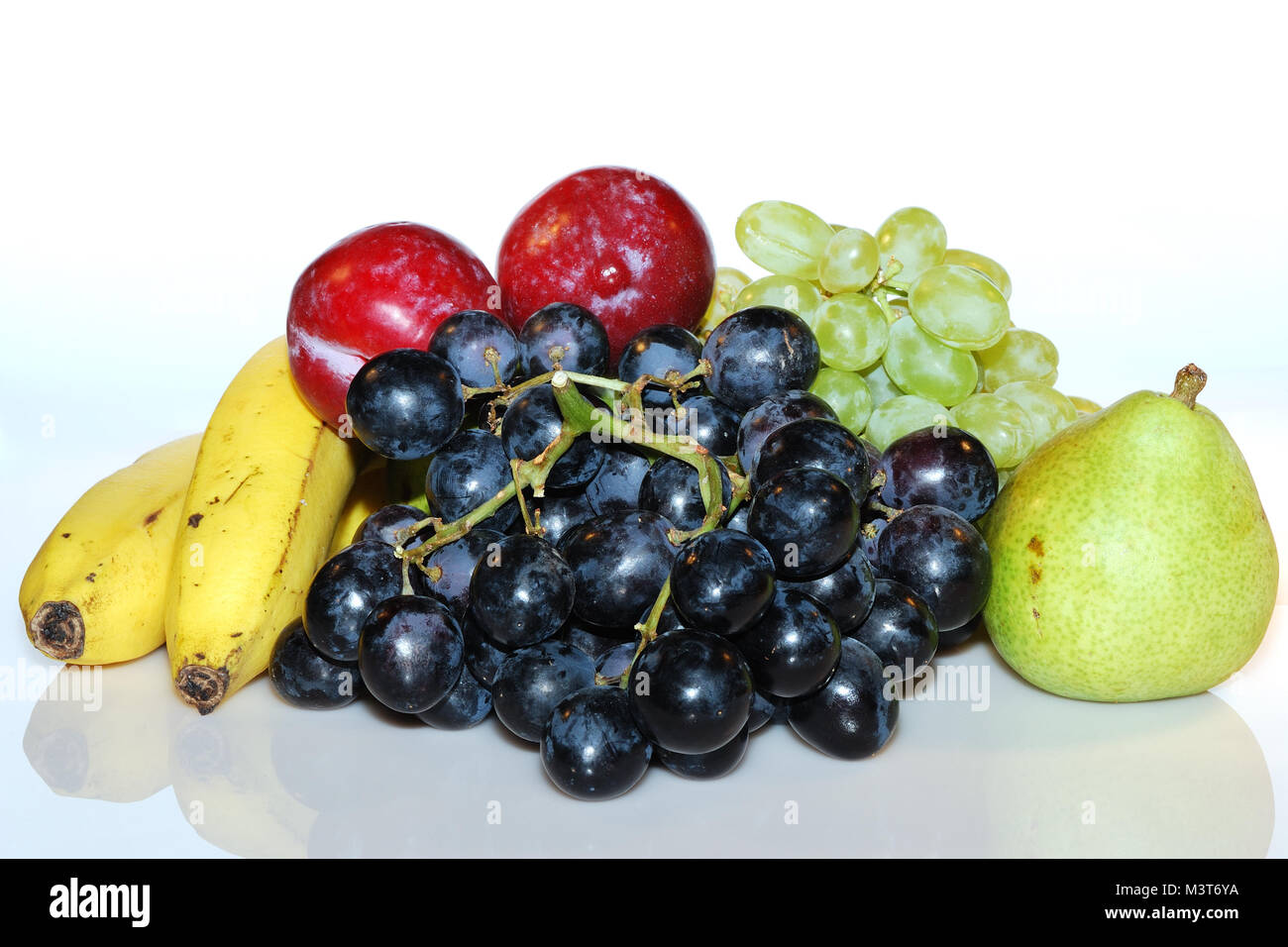 many fresh healthy range of fruits, apple banana grapes Stock Photo - Alamy