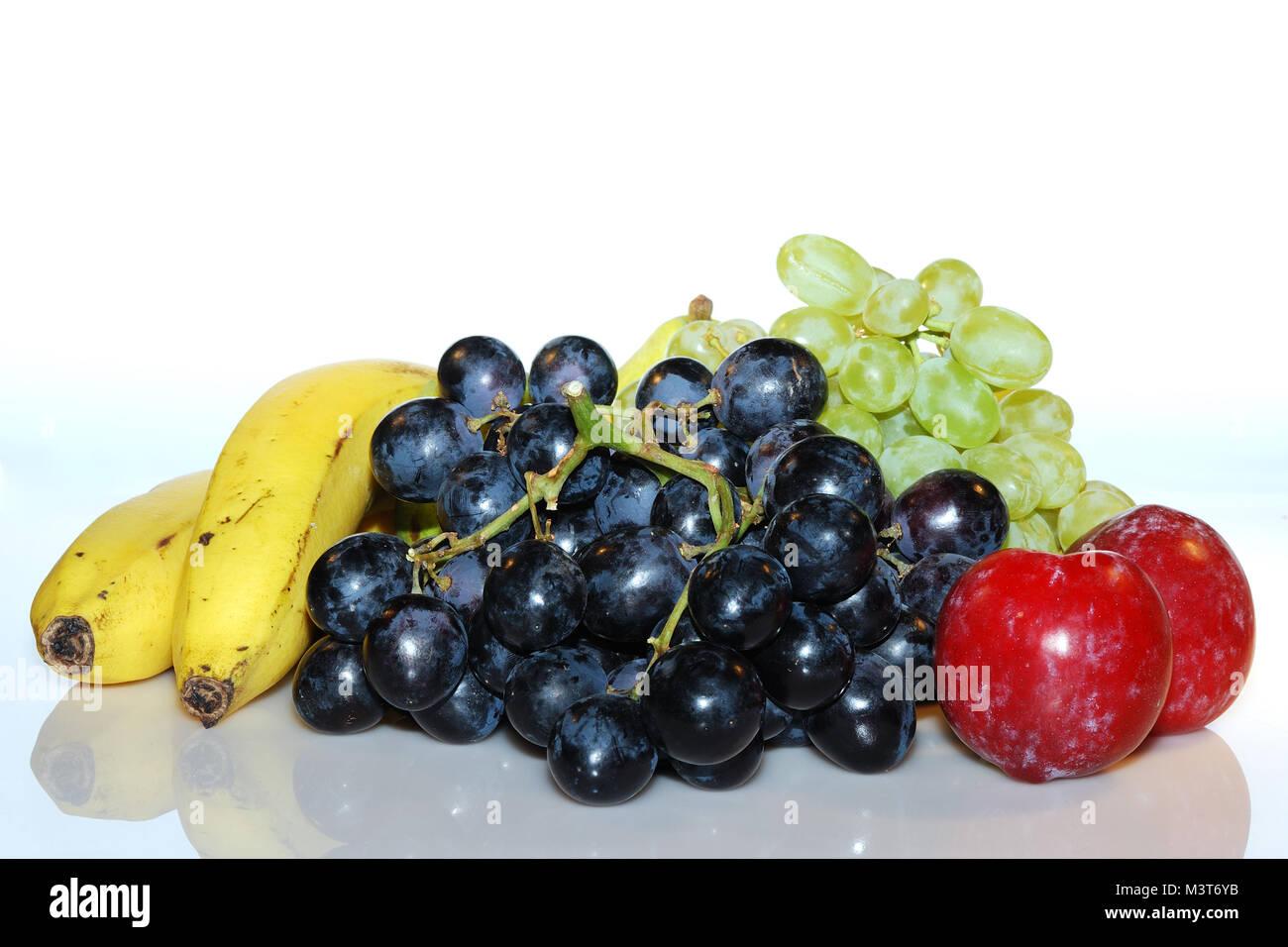 many fresh healthy range of fruits, apple banana grapes Stock Photo - Alamy