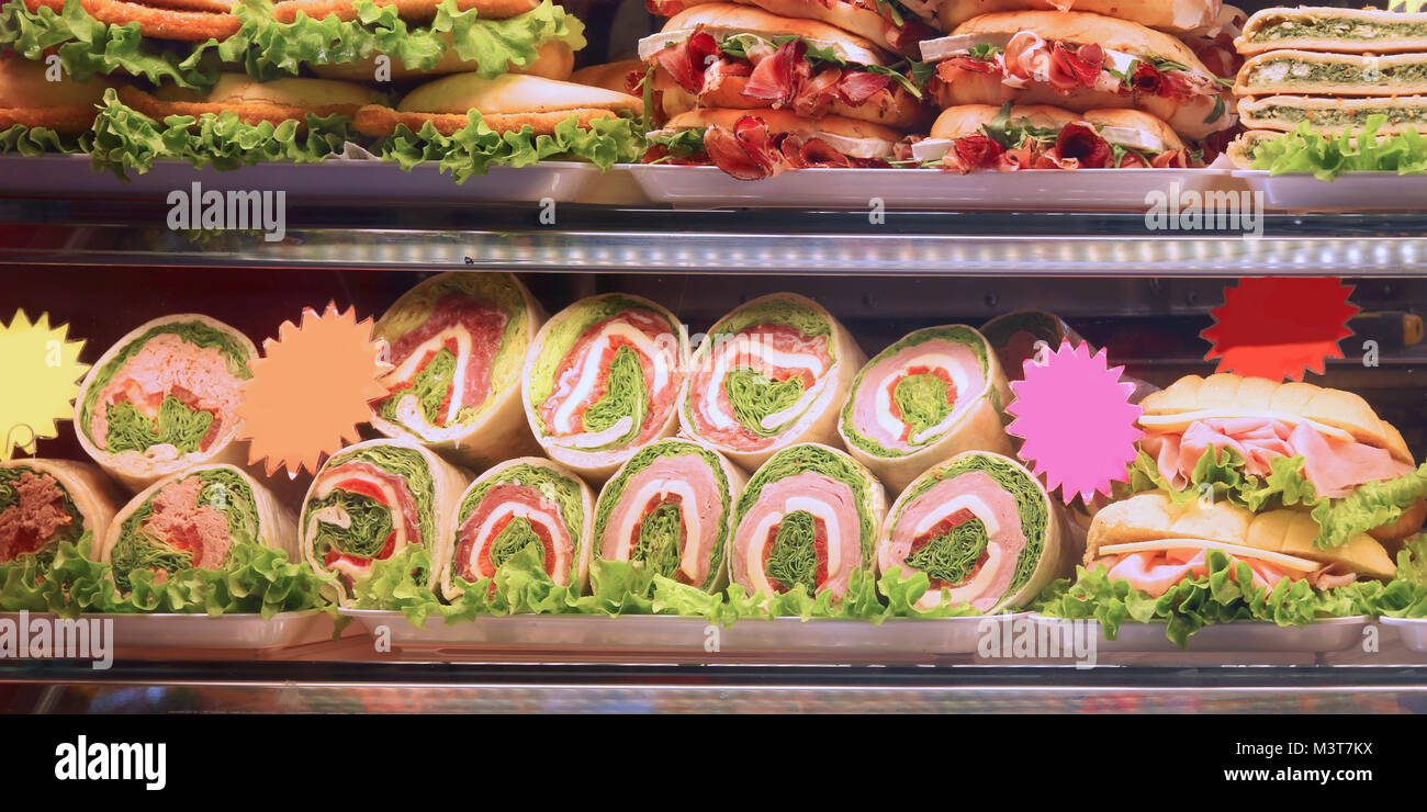 great and inviting window full of sandwiches and snacks in the well ...