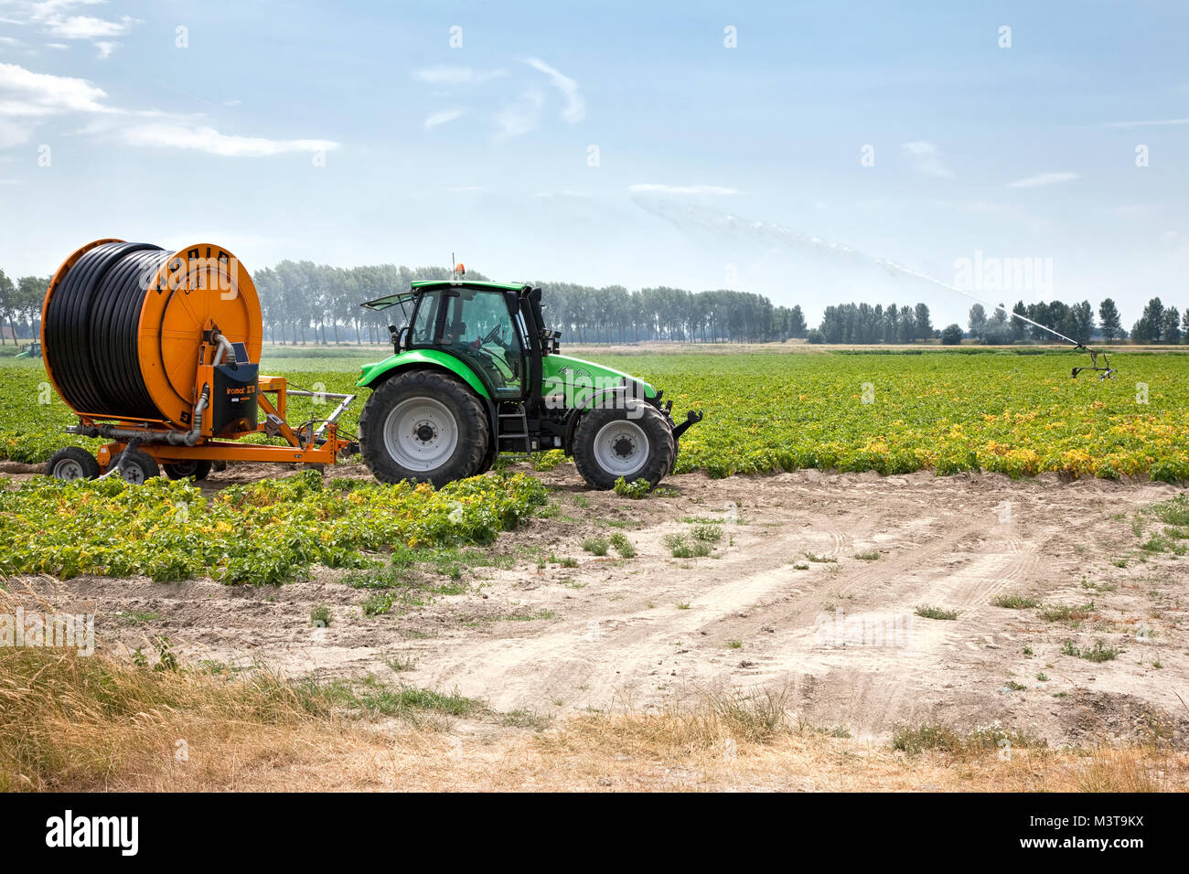agriculture irrigation machine on a farm field during a long period ...