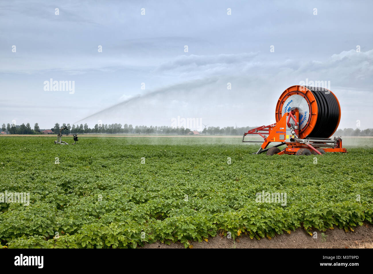 agriculture irrigation machine on a farm field during a long period ...