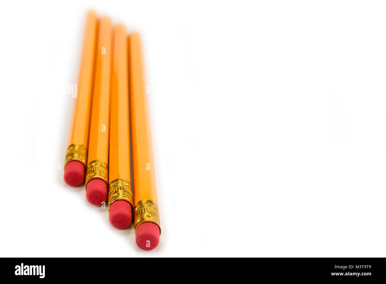 Yellow pencils with eraser on the white background Stock Photo - Alamy