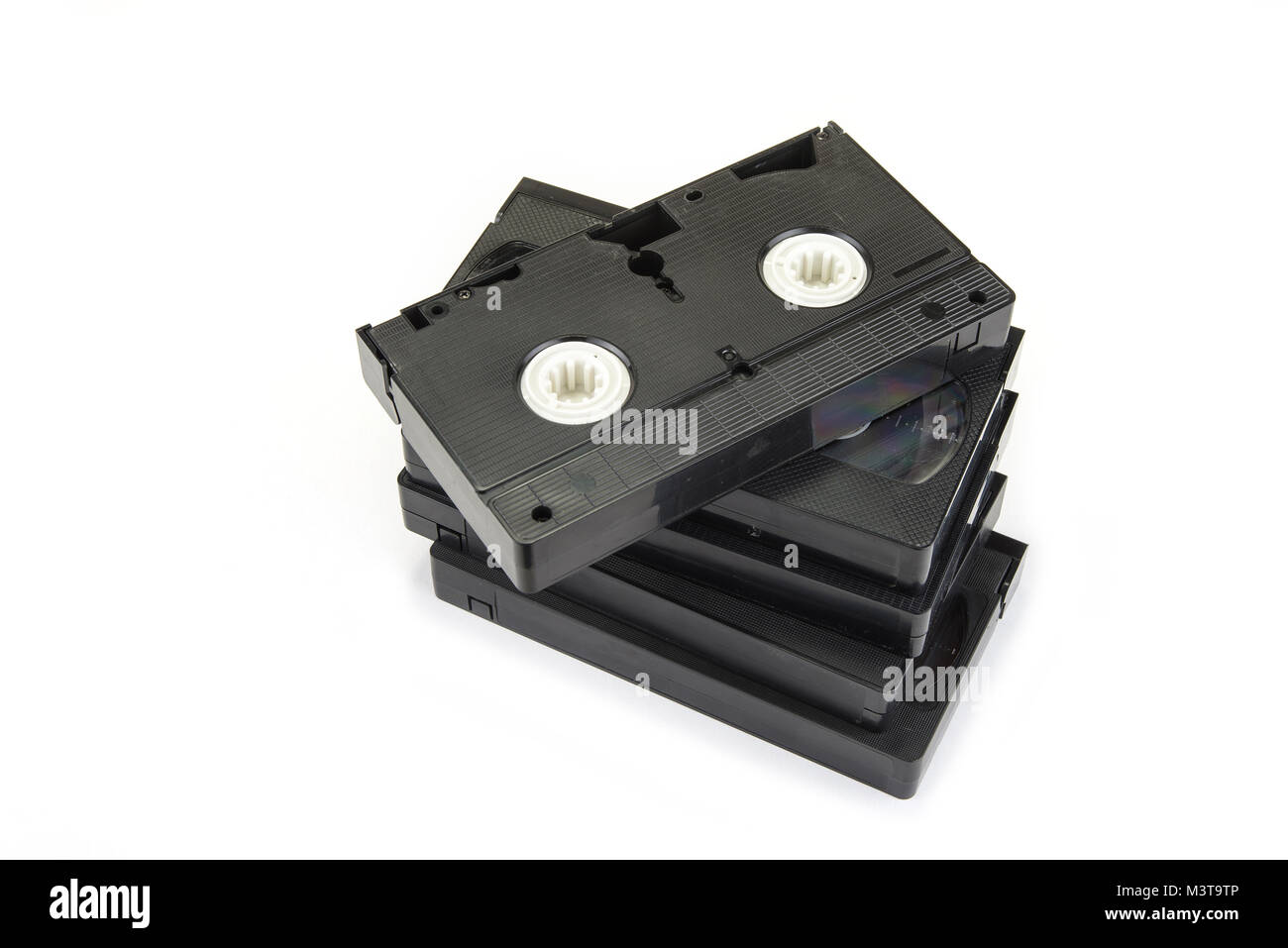 Pile of black vhs videotapes on the white background Stock Photo - Alamy