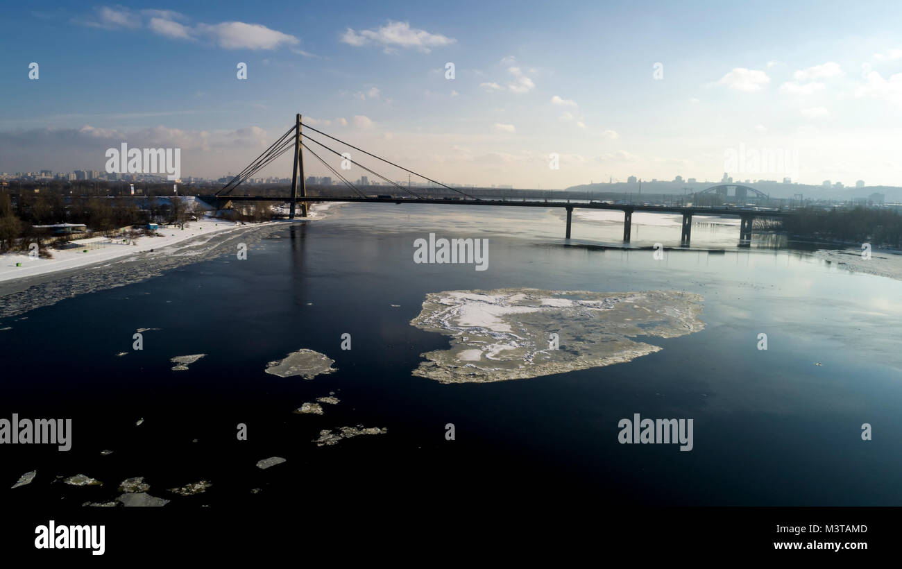 Landscape with suspension Moscow Bridge across the Dnieper river ...