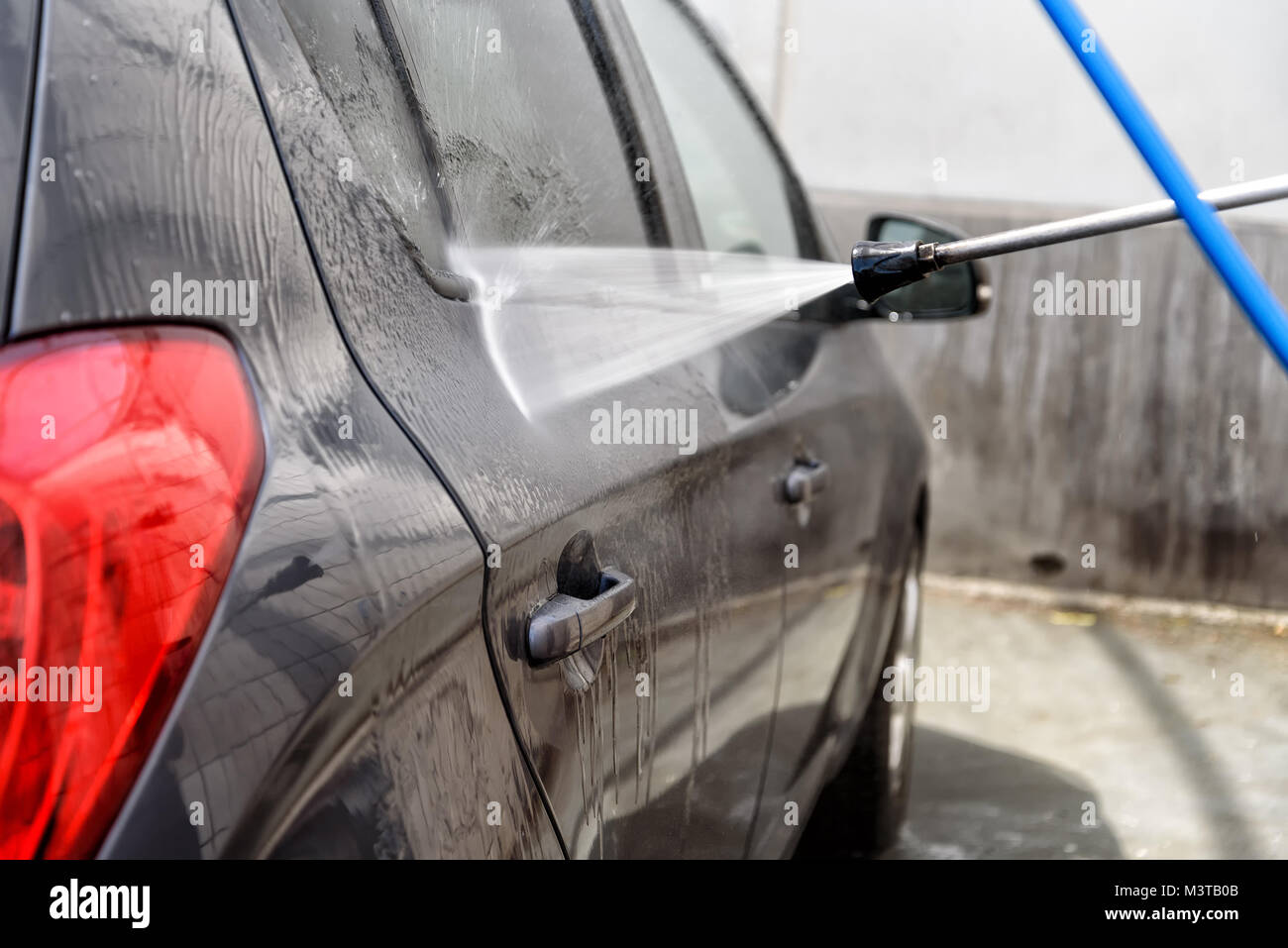 car is washed at the car wash Stock Photo - Alamy