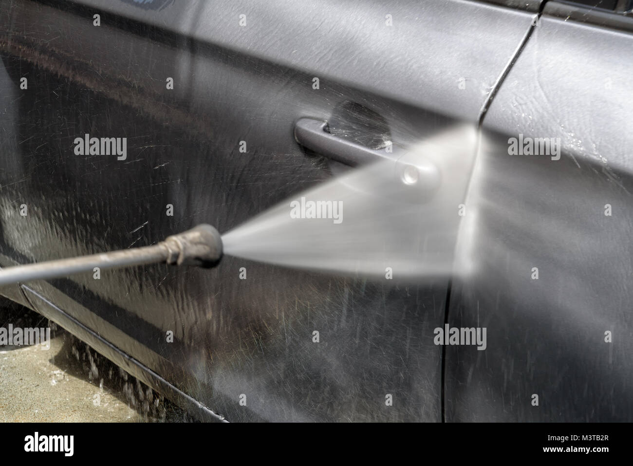 car is washed at the car wash Stock Photo - Alamy
