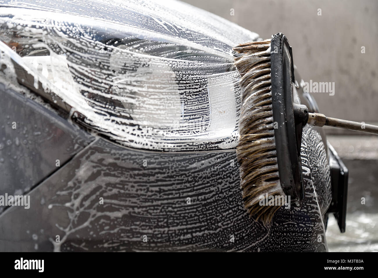 car is washed at the car wash Stock Photo - Alamy