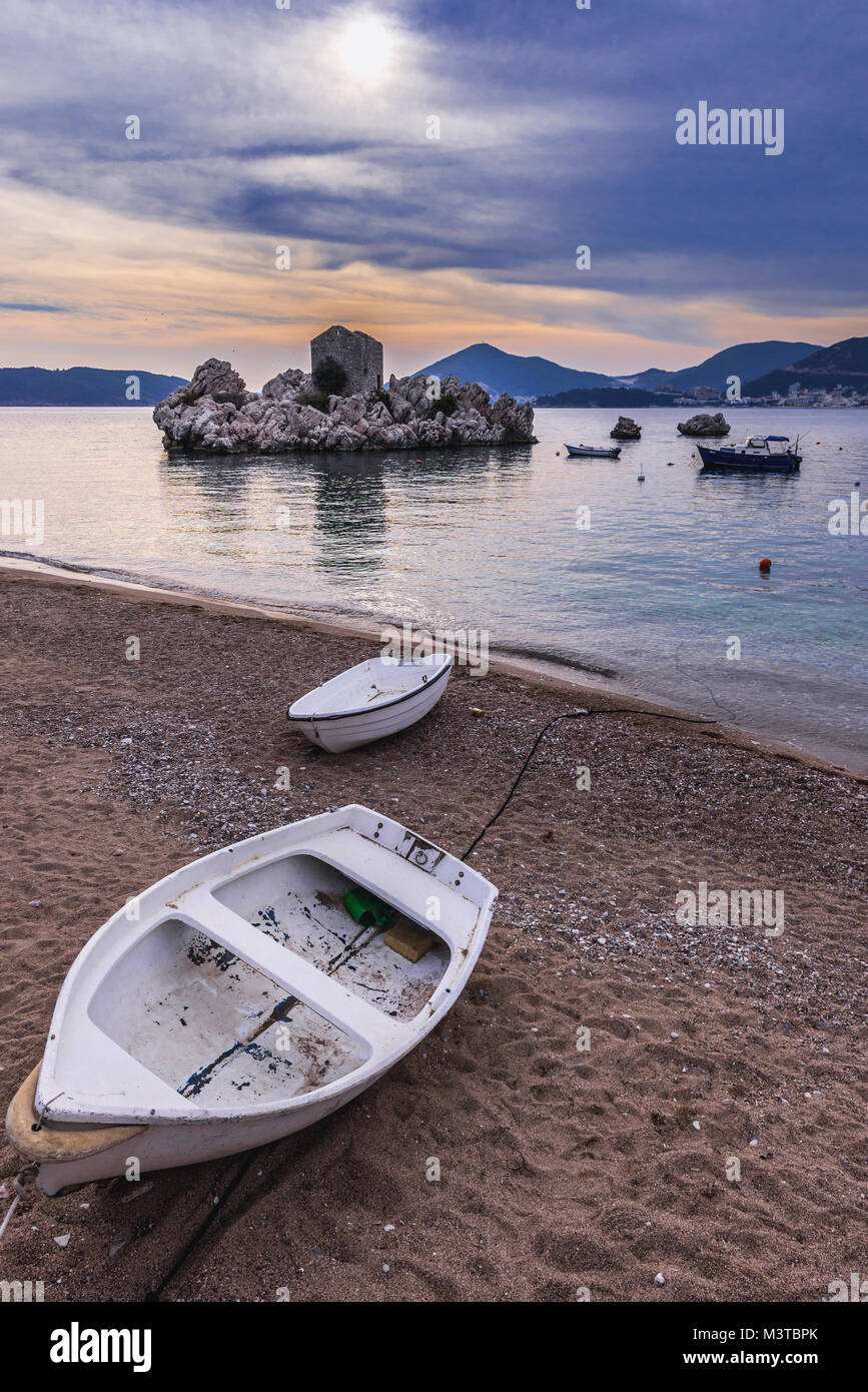Small boat on a beach in Przno resort village on the Adriatic Sea coast ...