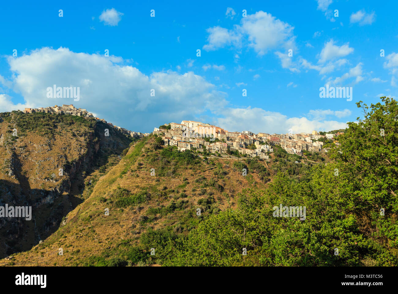 Calabria summer view with beautiful old village on mountain hill top ...