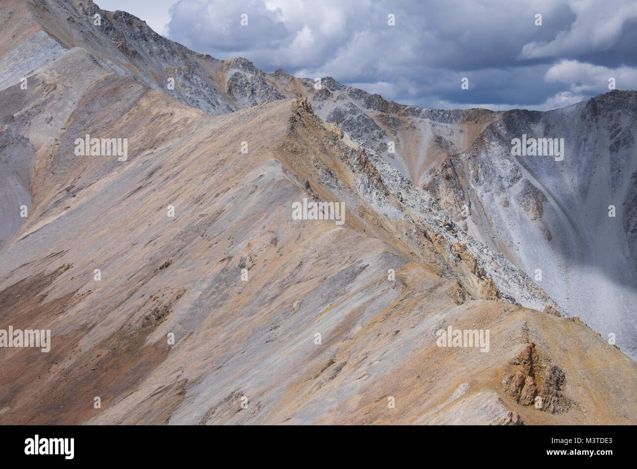 Sharp and dangerous rocks composed of sedimentary rocks Stock Photo - Alamy