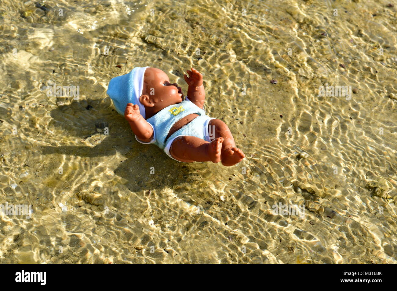 Barbie boy dolls at the beach playing Stock Photo - Alamy