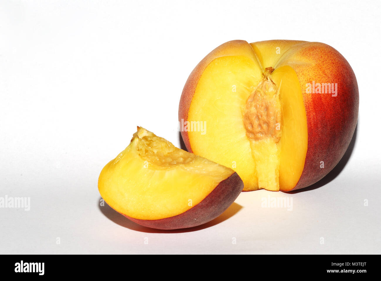 fresh juicy ripe nectarine sliced fruit Stock Photo - Alamy