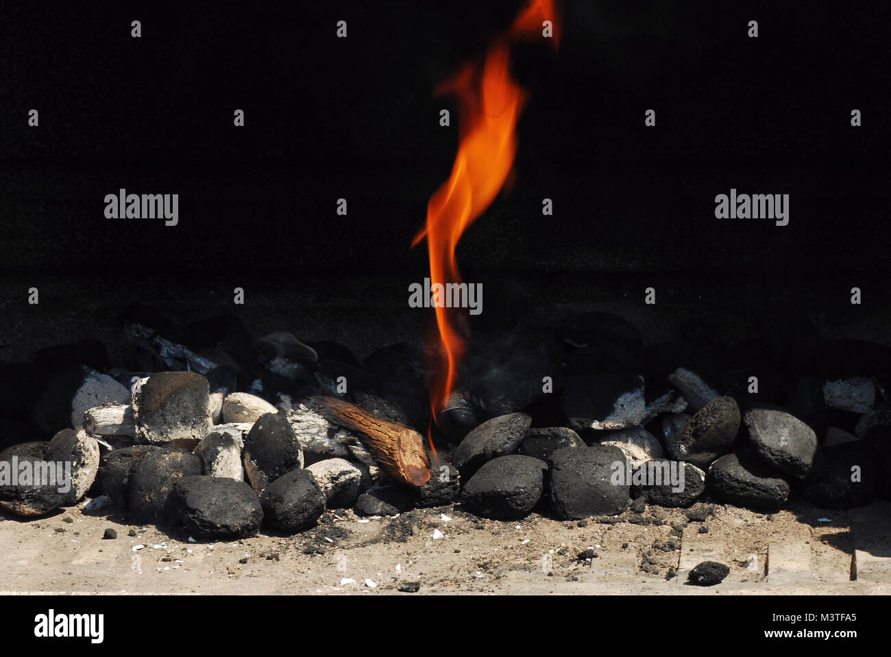 many hot glowing coal for grilling and burning in the summer Stock ...