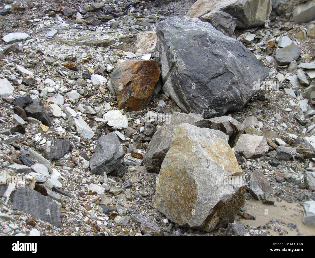 many large heavy stone in the quarry with mineral Stock Photo - Alamy
