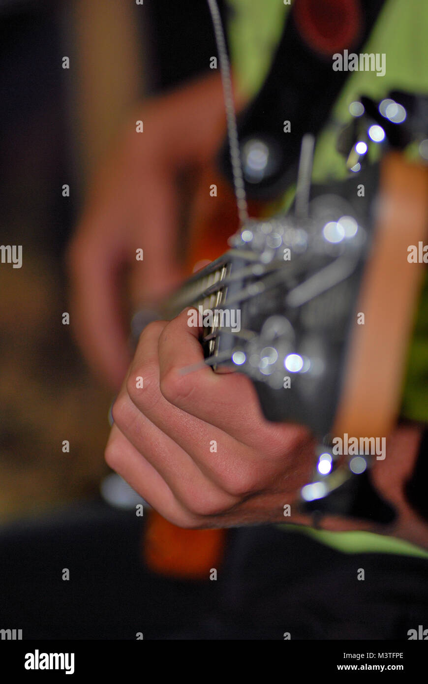 bass player with concert musician with bass guitar Stock Photo - Alamy