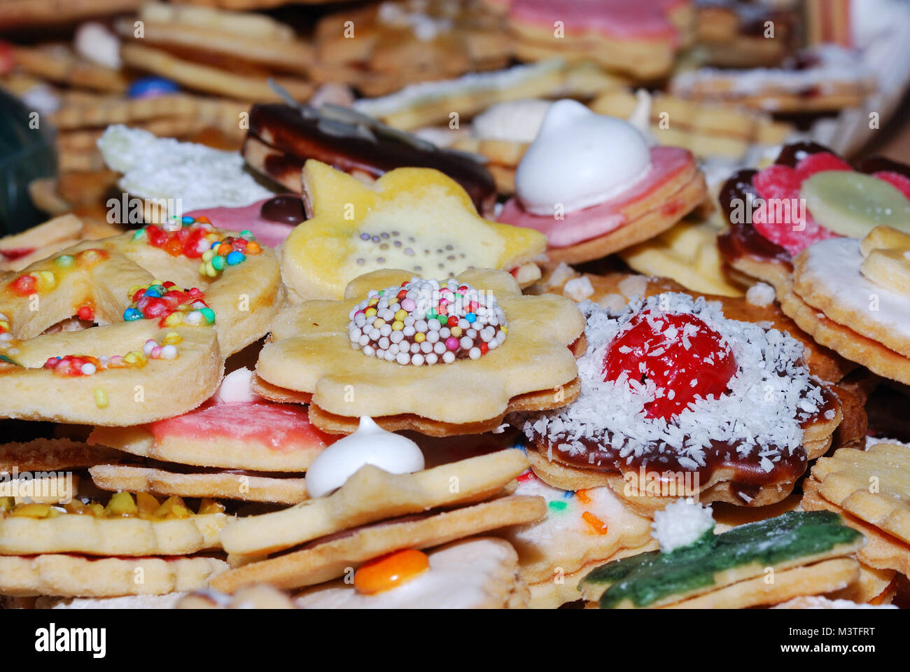 many sweet biscuits with almonds and cherries for christmas Stock Photo ...