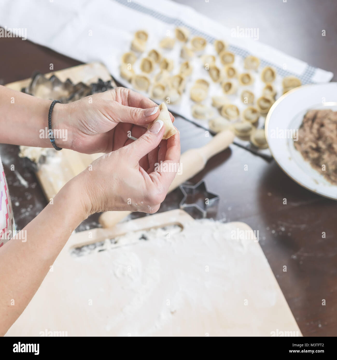 The process of making delicious homemade dumplings. On the kitchen ...