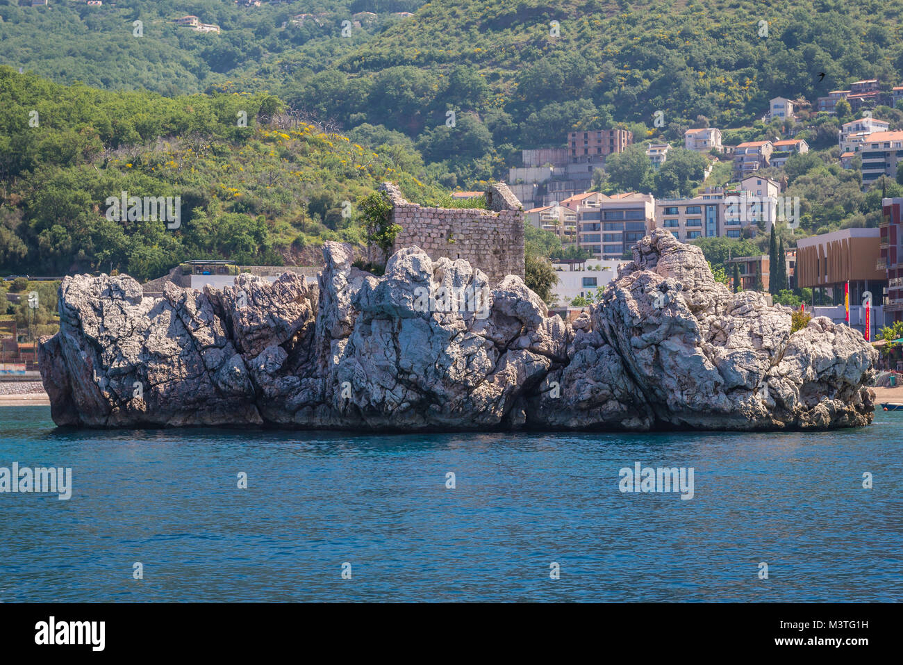 Rocky shore of Przno village in municipality of Budva over Adriatic Sea ...