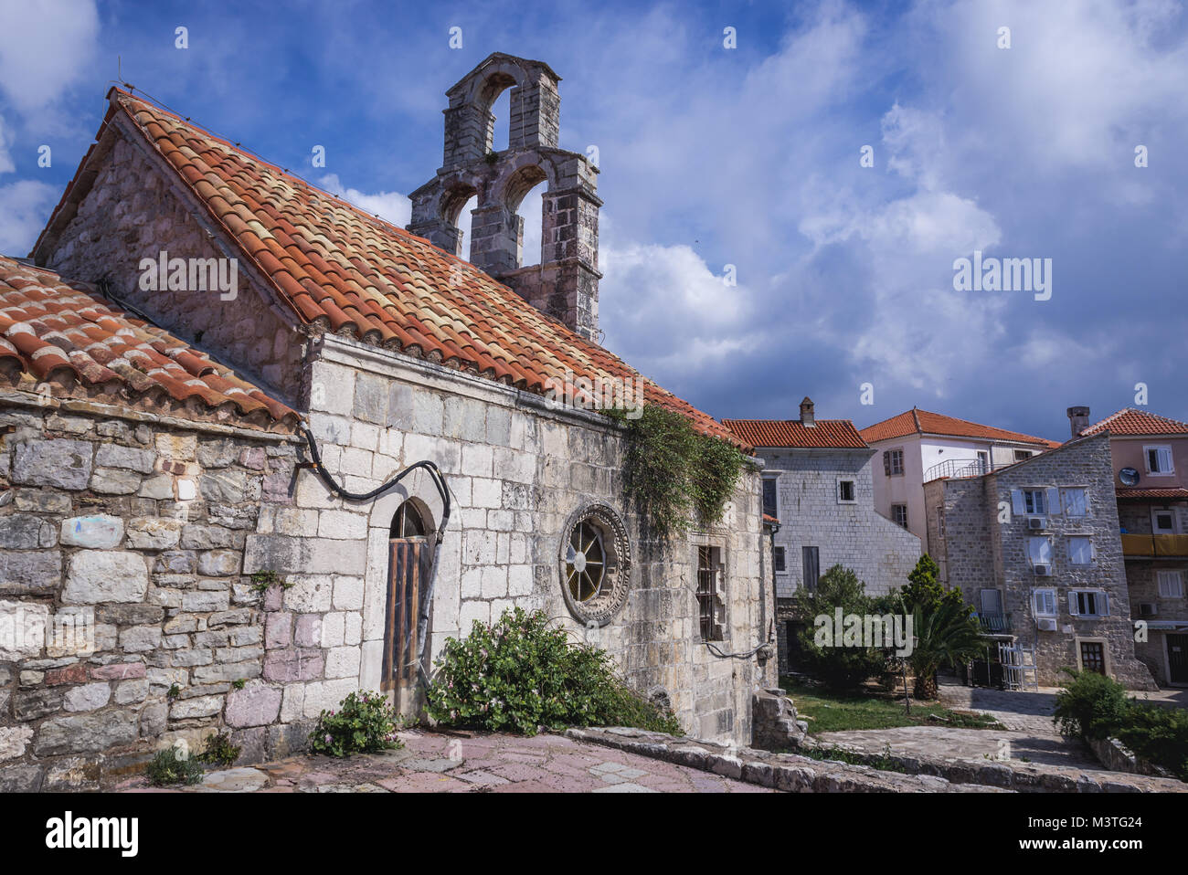 Side view of Church of Santa Maria in Punta on the Old Town of Budva ...
