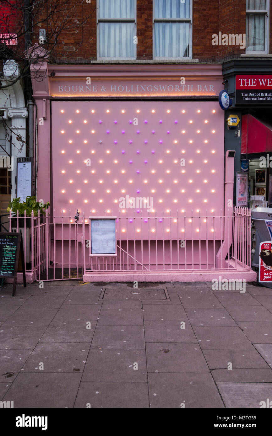 A pink illuminated frontage to the Bourne and Hollingsworth Bar ...