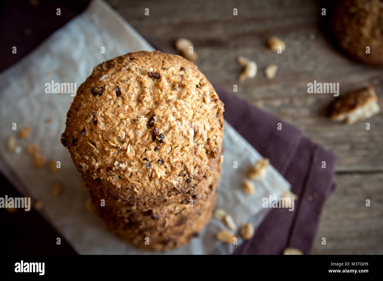 Homemade oatmeal cookies with lin and sesame seeds on dark rustic ...