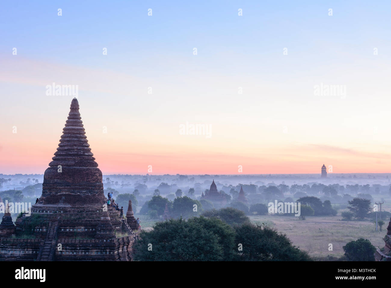 Bagan: temple with tourists, temples, stupas, Nan Myint observation ...