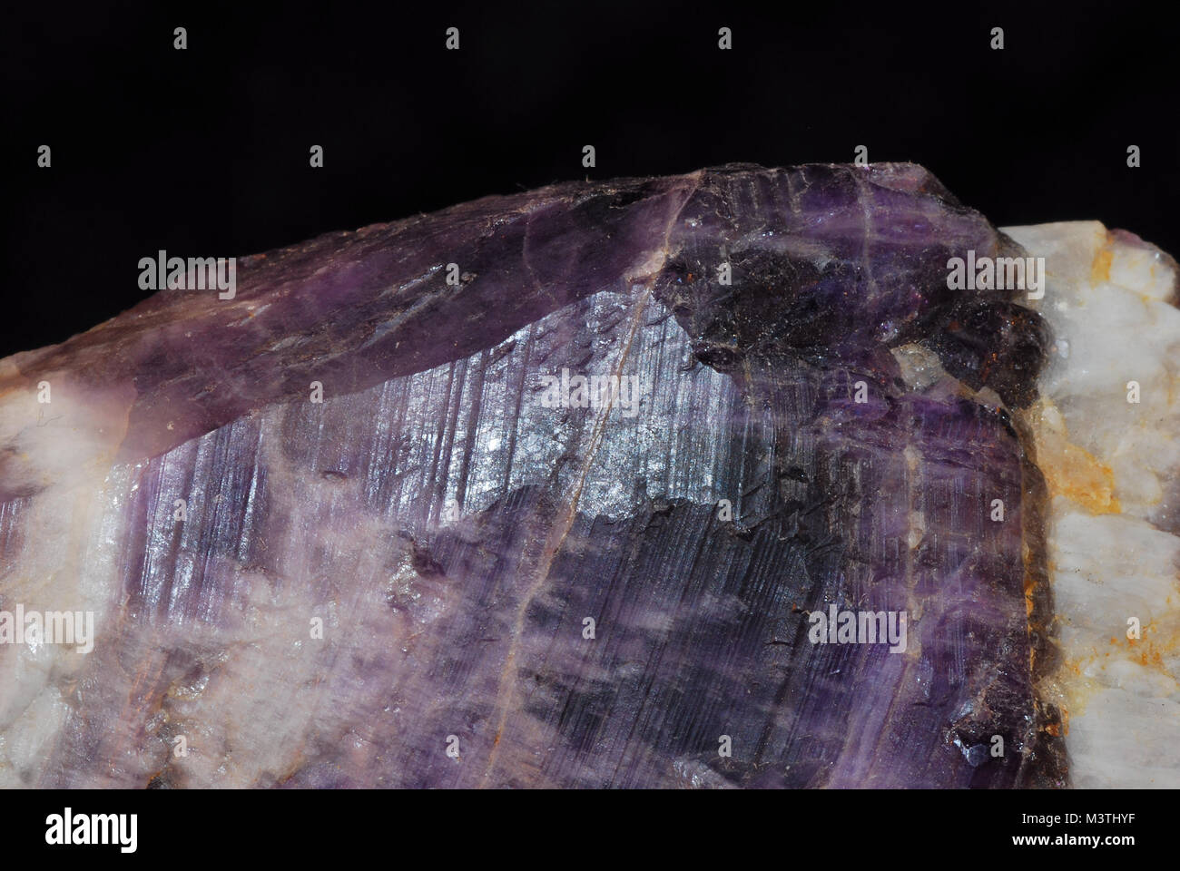 bright purple amethyst mineral raw edged out of the quarry Stock Photo ...