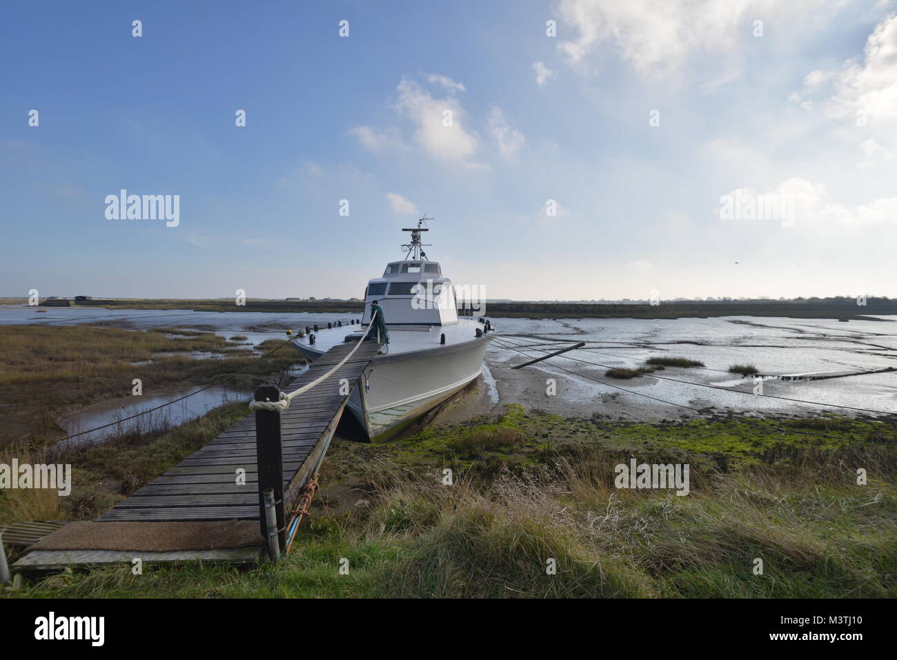 House Boats in the Essex Salt Marshes-low tide clear bright blue sky ...