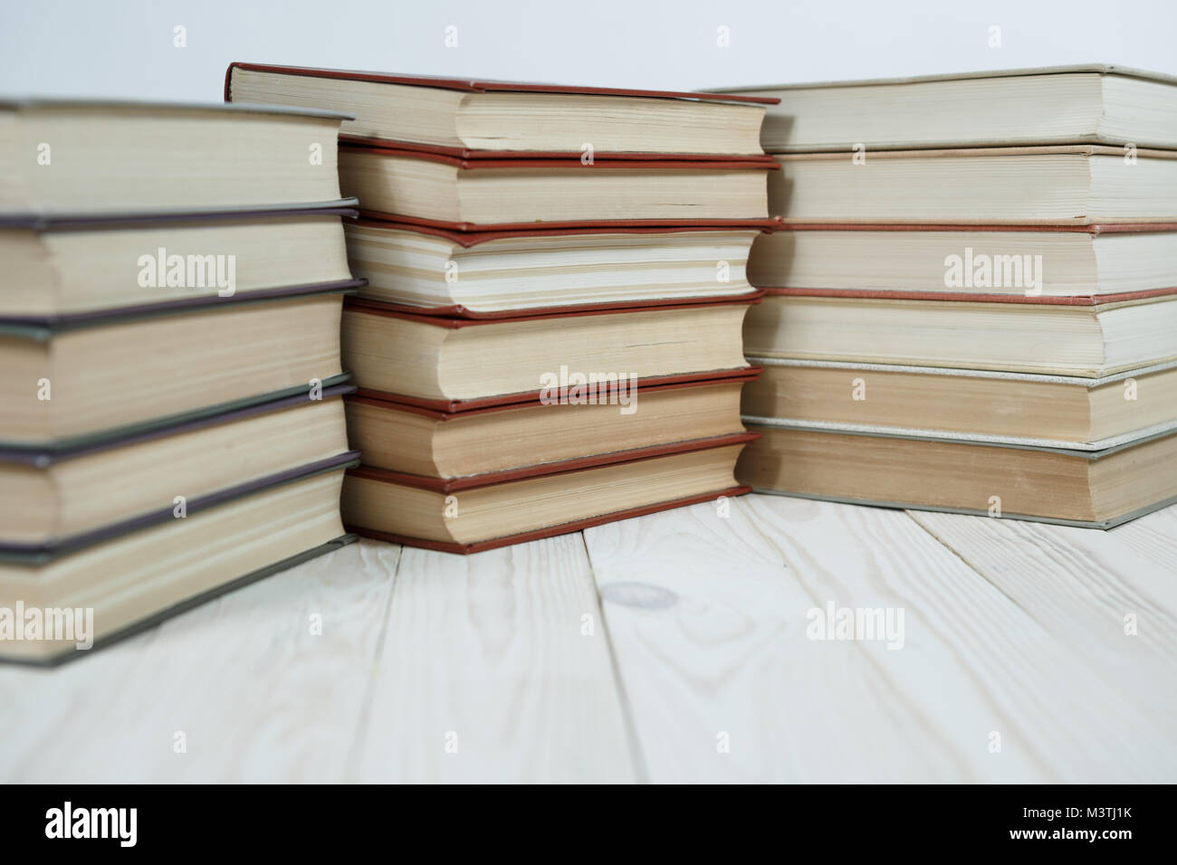 Pile of old books stacked on top of each other. Selective focus with copy space Stock Photo - Alamy