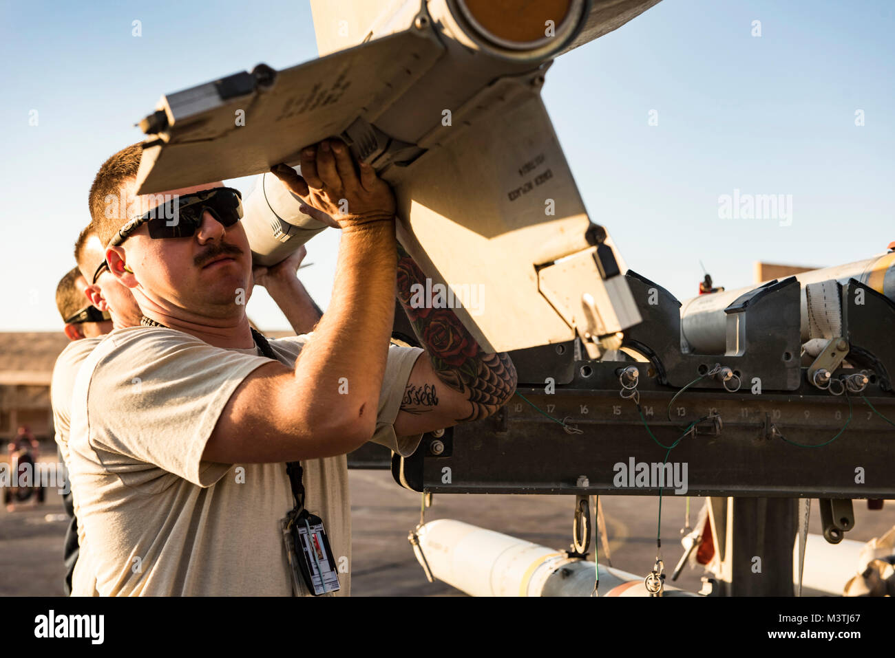 Airmen assigned to the 332d Expeditionary Maintenance Squadron work ...